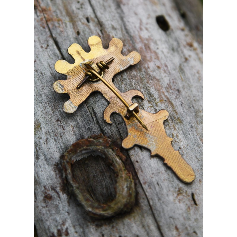 Fibule à tête rayonnante